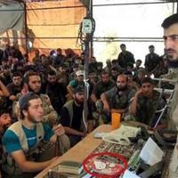 Jihadist leader in Syria addresses militants with Hello Kitty notebook ...