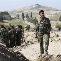 Peshmerga fighters to deploy to Kobane with heavy weapons: Kurdish ...
