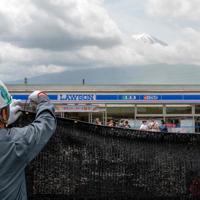 Holes poked in Mount Fuji barrier, Japan town says - World News