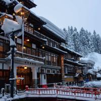 Picturesque Japan hot spring town limits day trippers