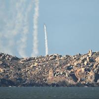 China fires rockets on second day of military drills around Taiwan ...